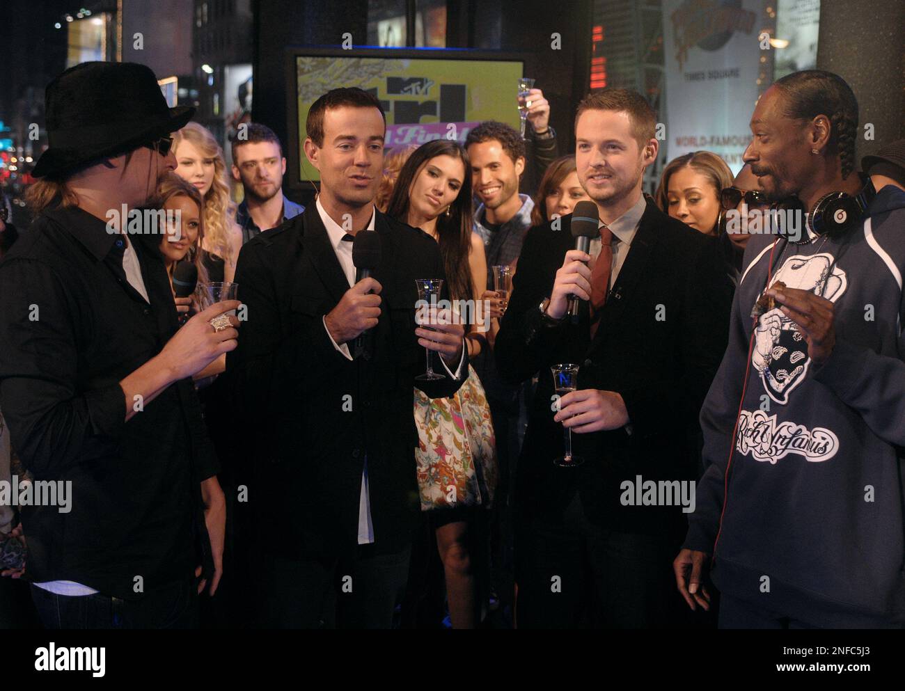 From left, singer Kid Rock, MTV VJ's Carson Daly, Damien Fahey and ...