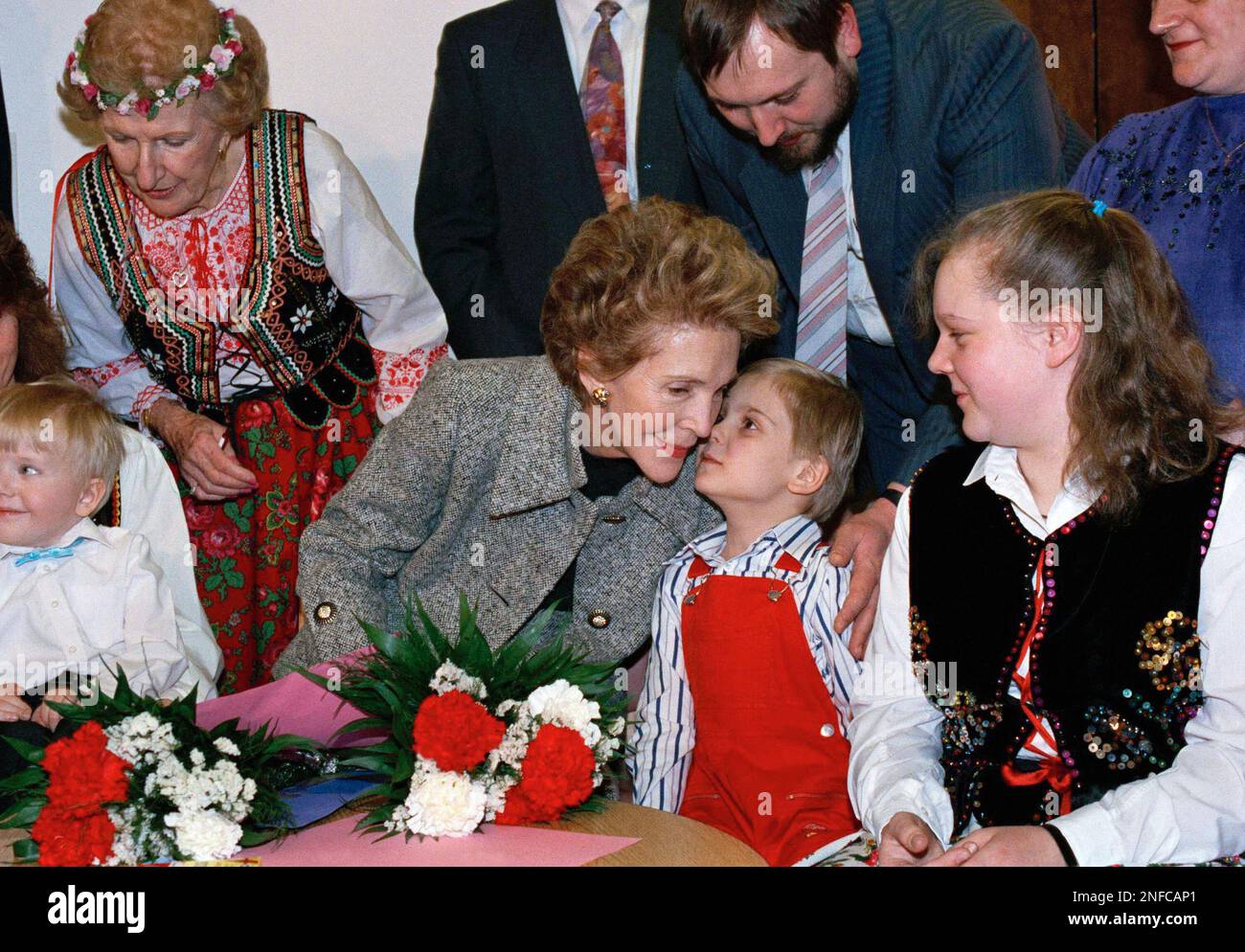 Former first lady Nancy Reagan gets ready for kiss from Ivan Vassily ...