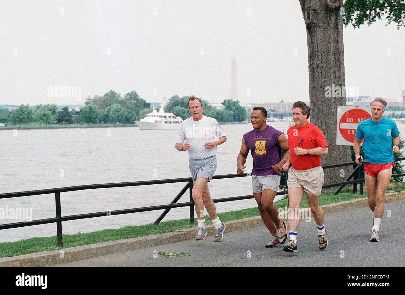 President George Bush, left, who celebrates his 65th birthday Monday ...