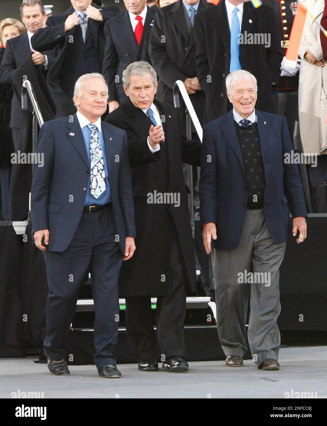 President Bush walks with former astronauts Edwin 'Buzz' Aldrin, left ...
