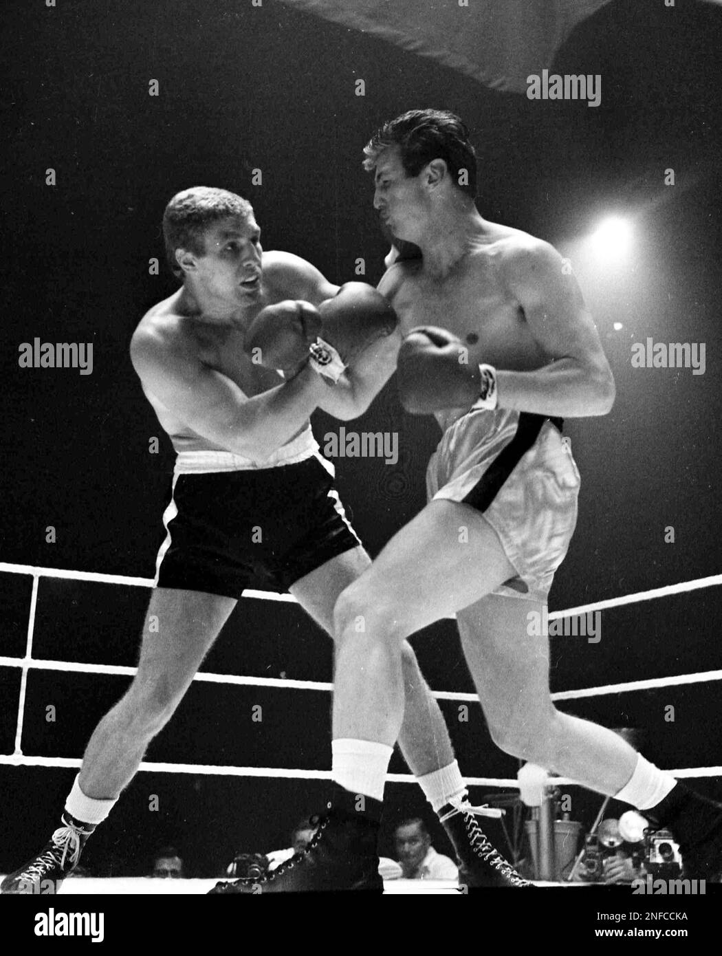 Billy Walker, left,and Johnny Prescott during the early rounds of their ...