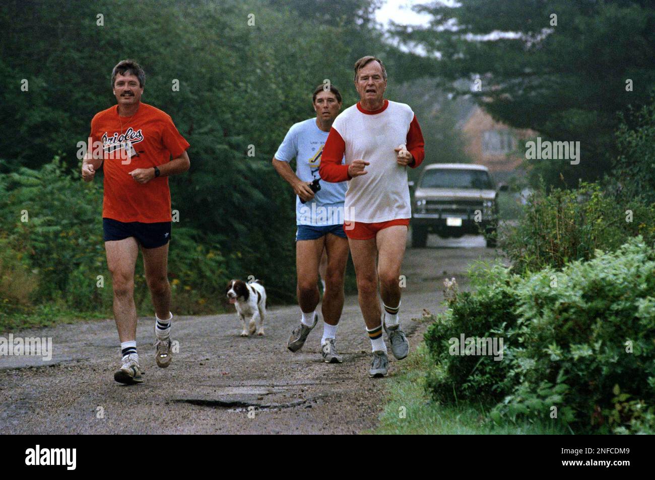 President George Bush is all smiles as he begins to turn around his ...