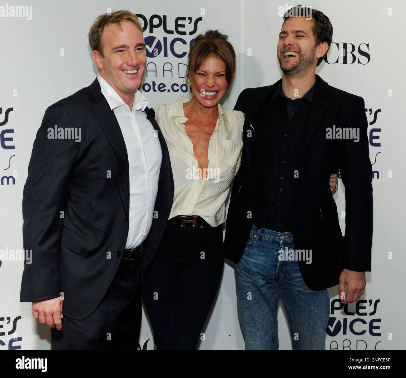 Jay Mohr, left, and his wife Nikki Cox pose with Joshua Jackson before nominations for the 35th ...