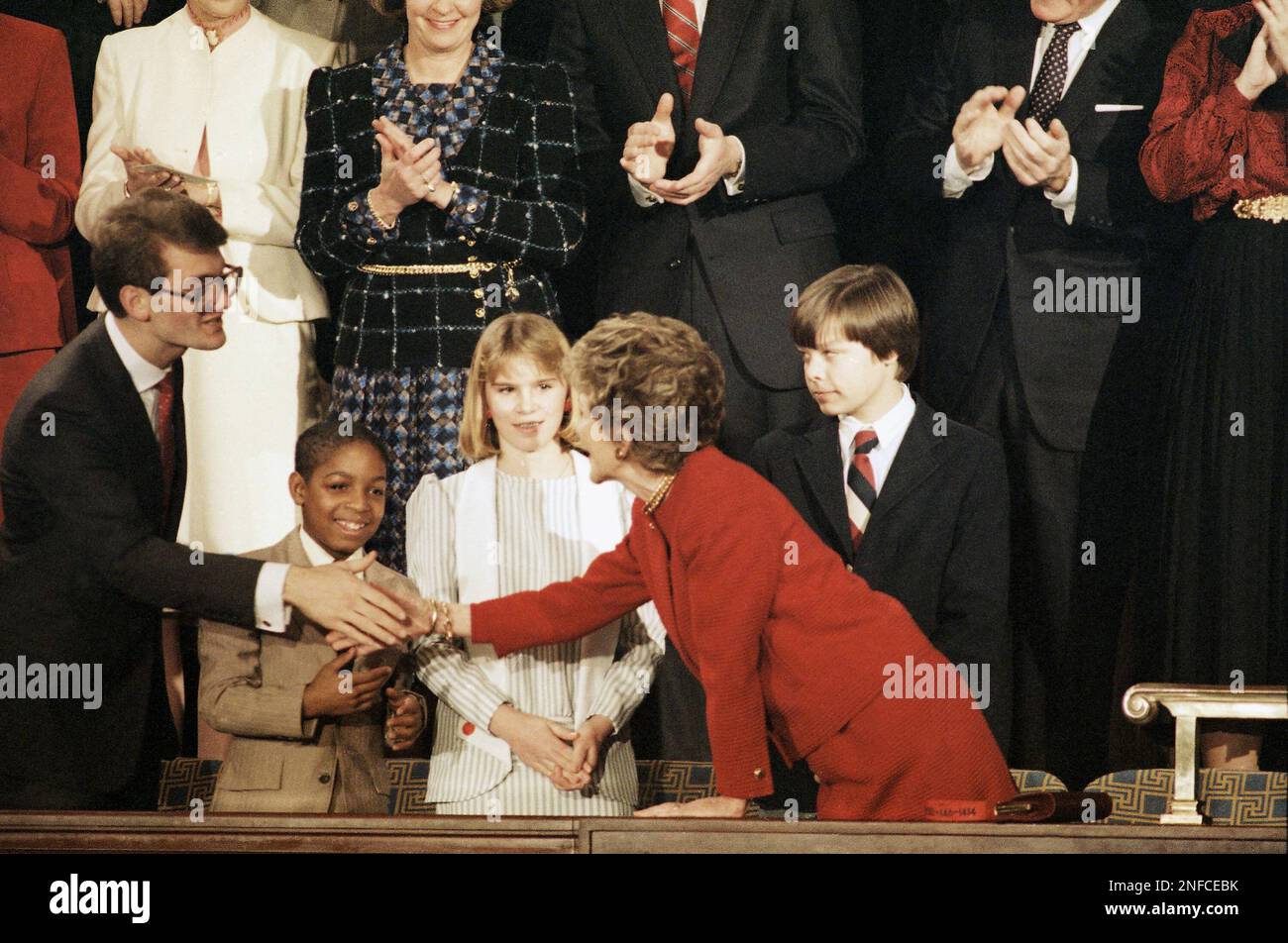 First lady Nancy Reagan congratulates, from left, Richard Cavoli ...