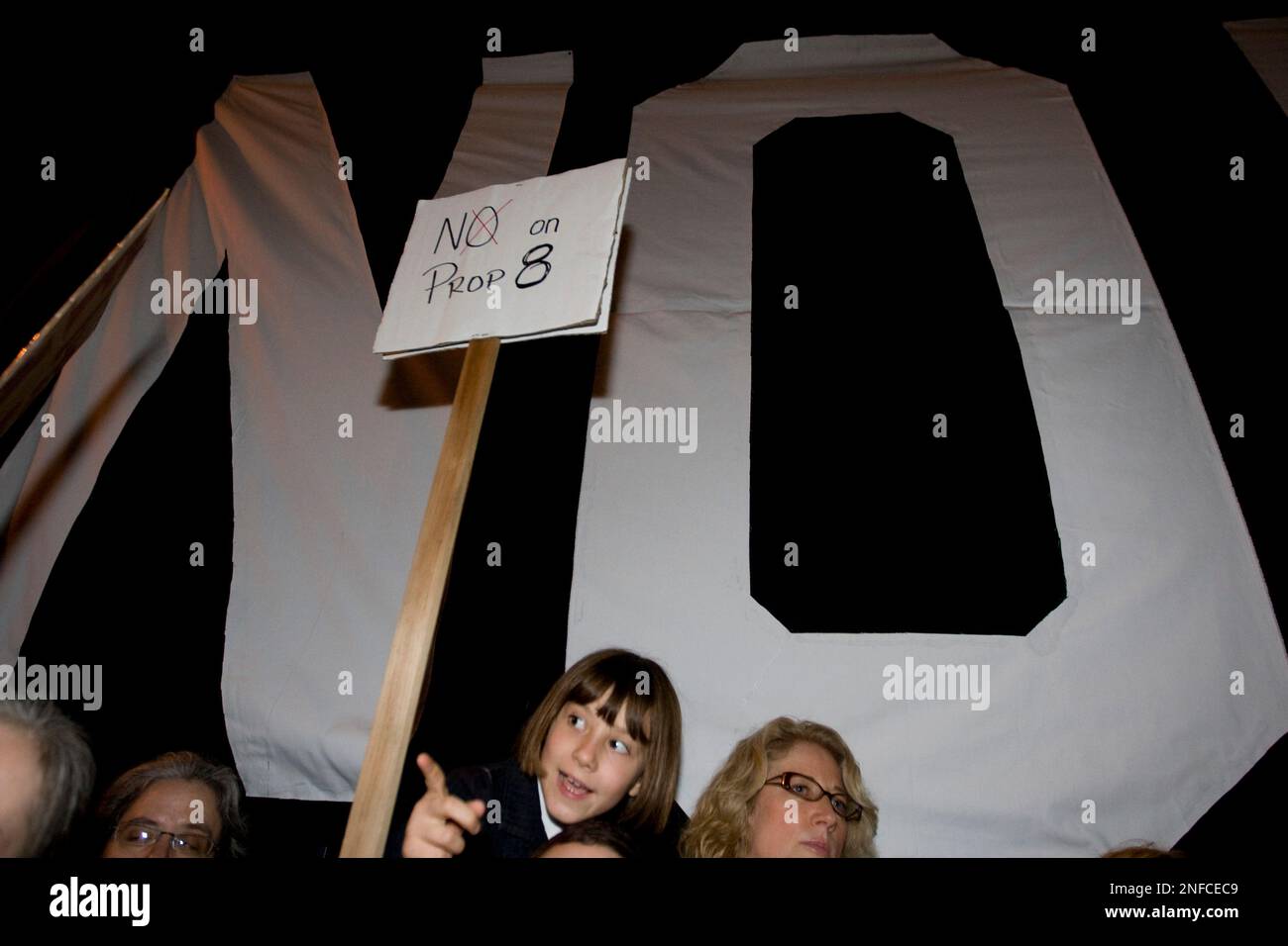 Demonstrators march on the streets of Los Angeles to protest ...