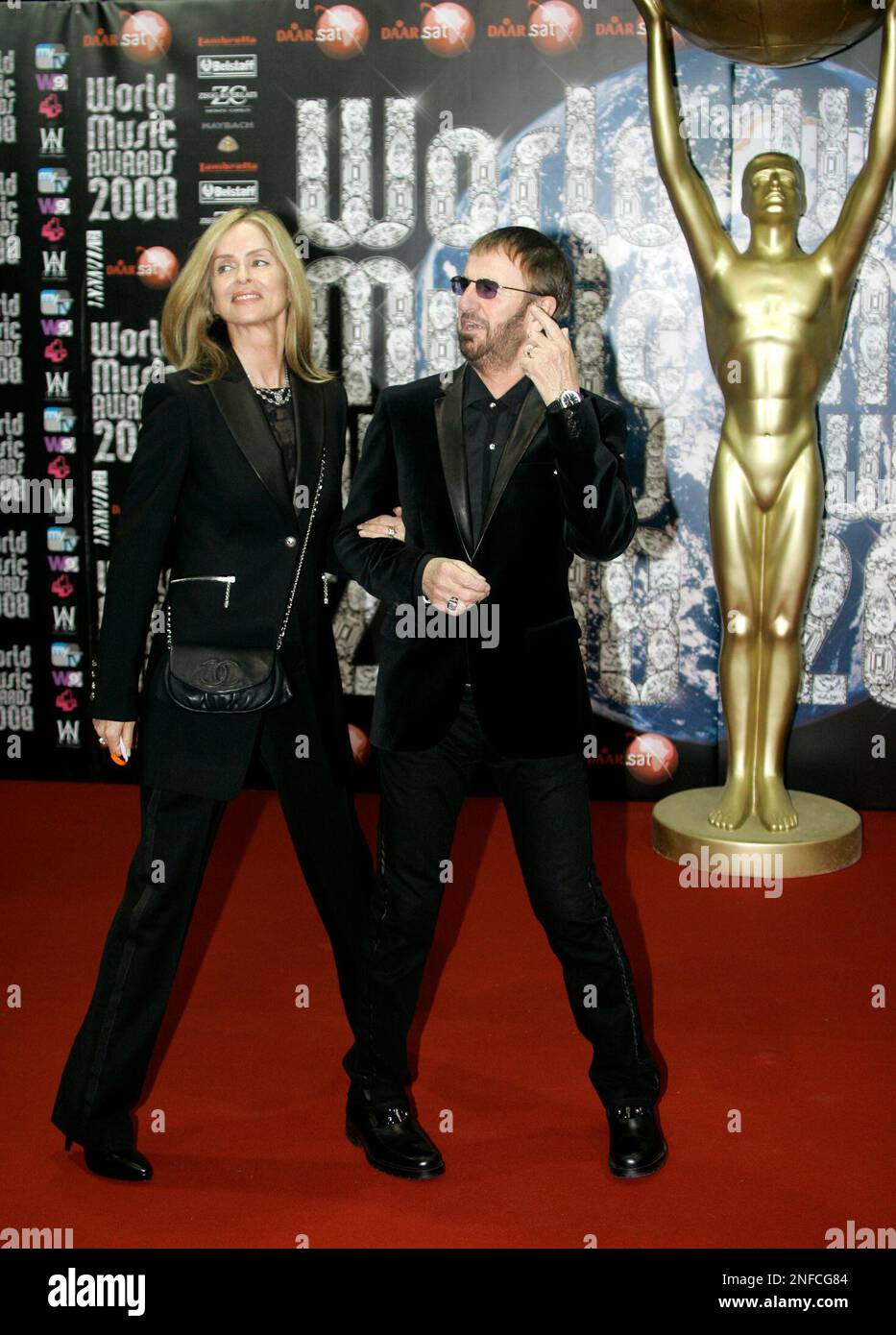 British singer Ringo Starr and his wife American actress Barbara Bach ...