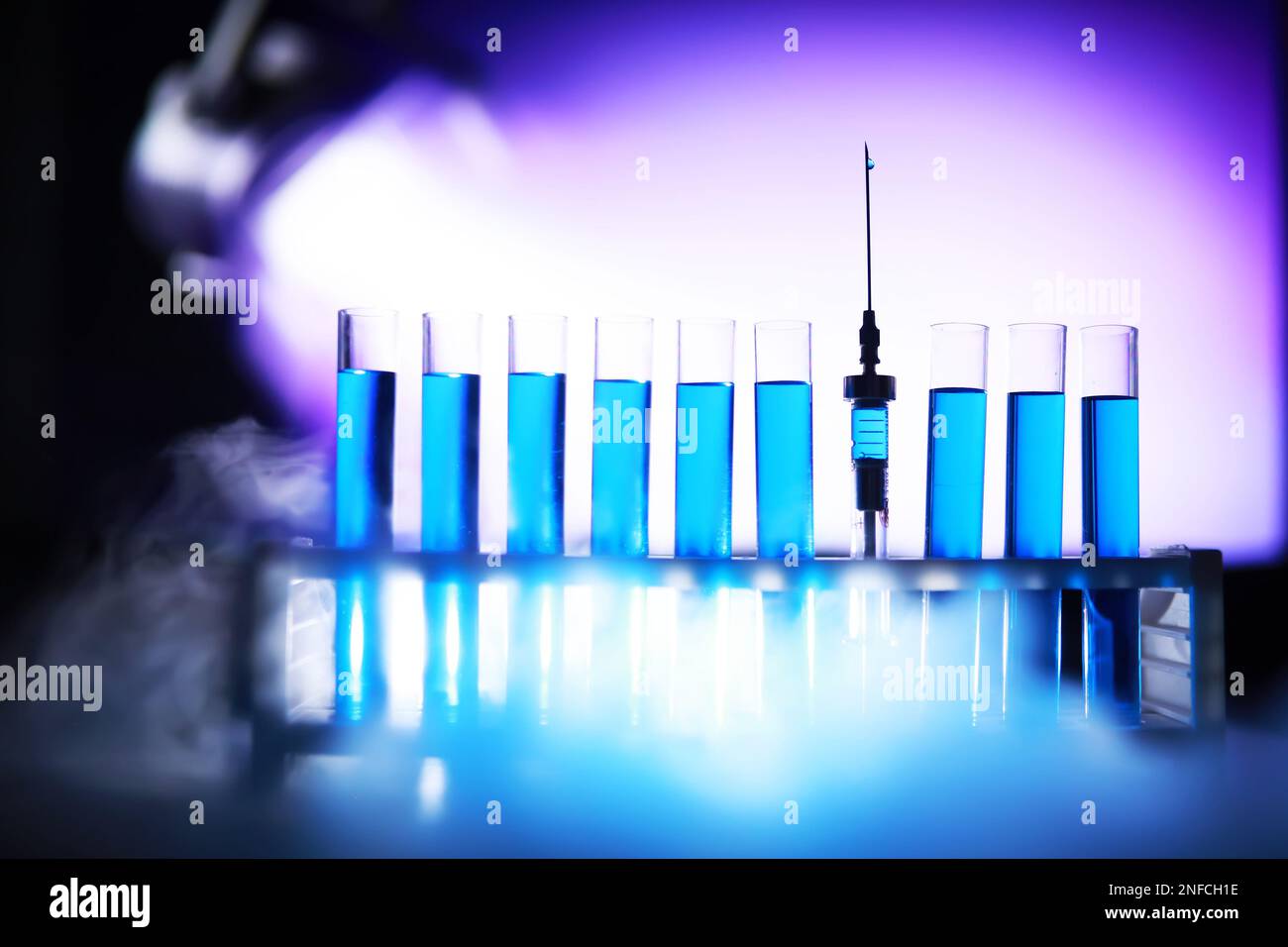 Test tube of glass overflows new liquid solution potassium blue ...