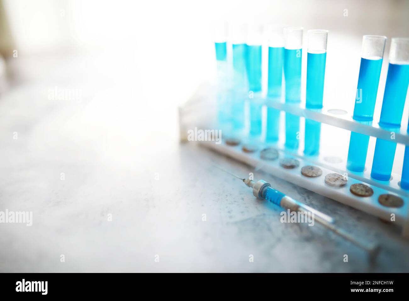 Test tube of glass overflows new liquid solution potassium blue ...