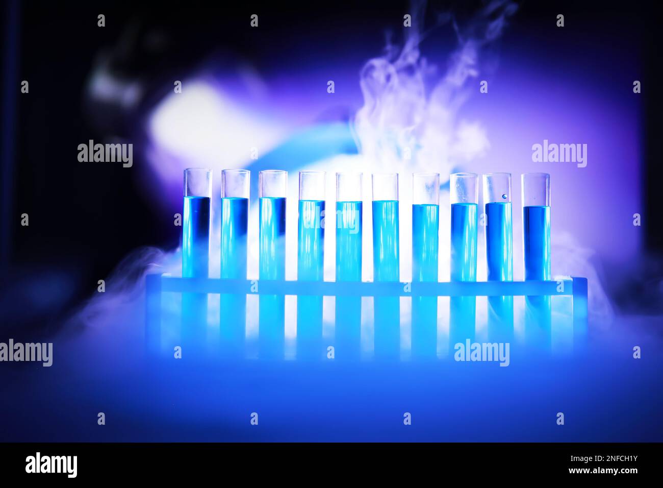 Test tube of glass overflows new liquid solution potassium blue ...