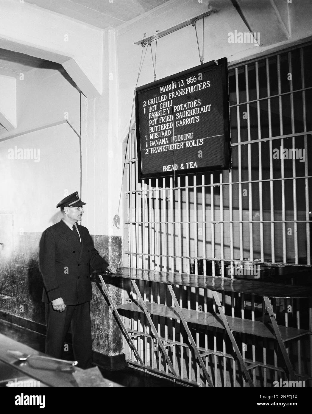 A typical prison menu as posted over the cafeteria-style table where ...