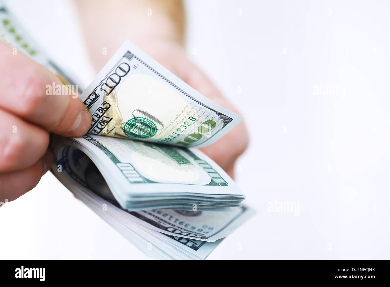 Cash money in a large pile as a finance background. Paper money close ...