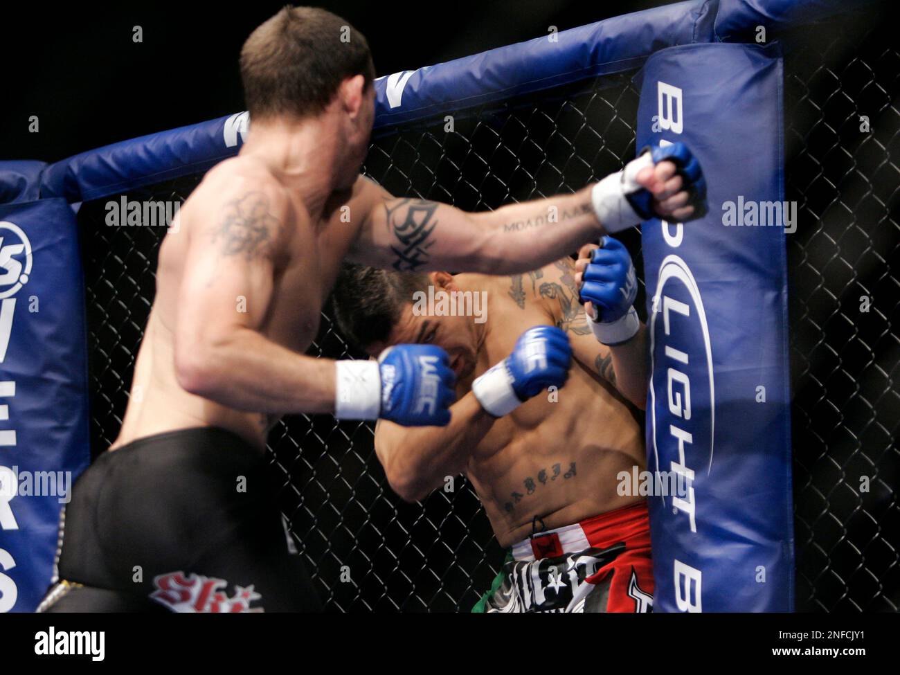 Jens Pulver, left, and Leonard Garcia fight during World Extreme ...