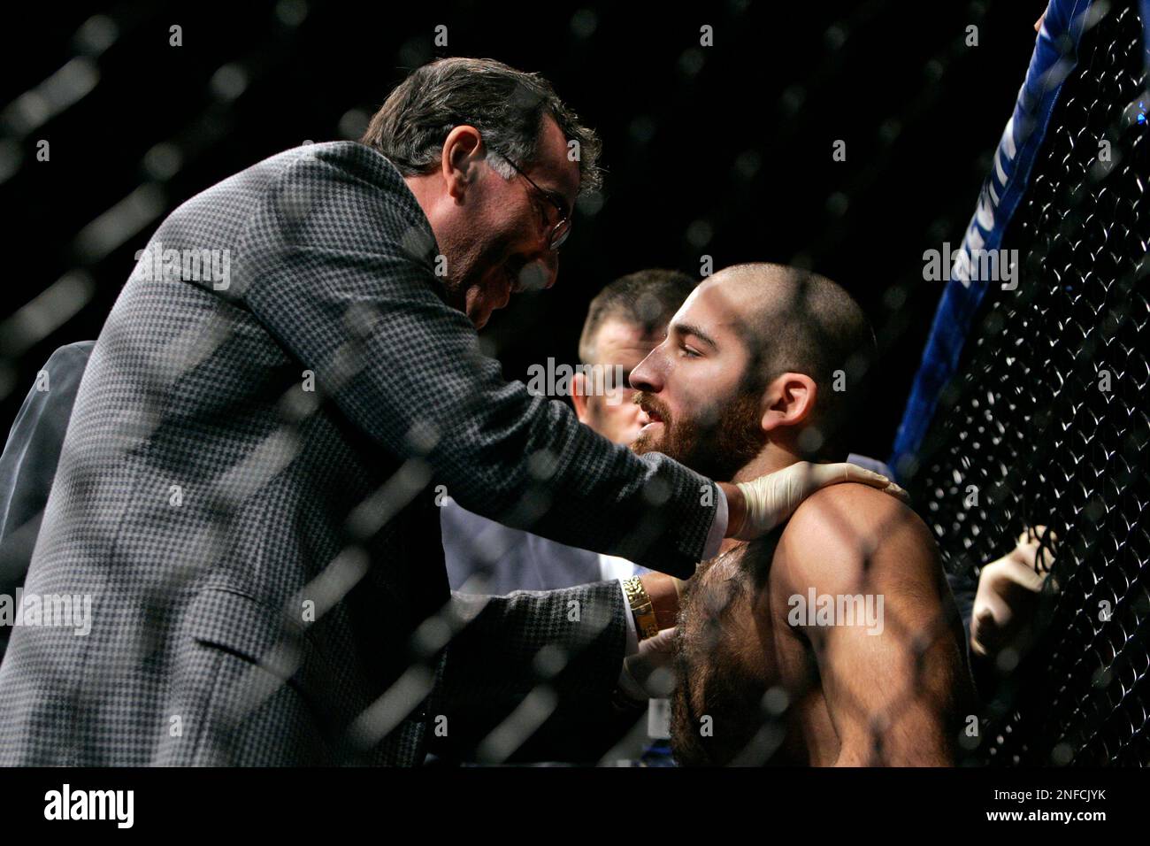 David Avellan is looked over after having lost to Aaron Simpson during World Extreme ...