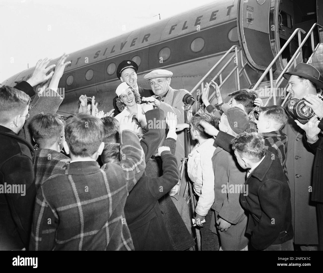 Children from St. Mary's Orphanage in Newark, N.J. gather around an ...