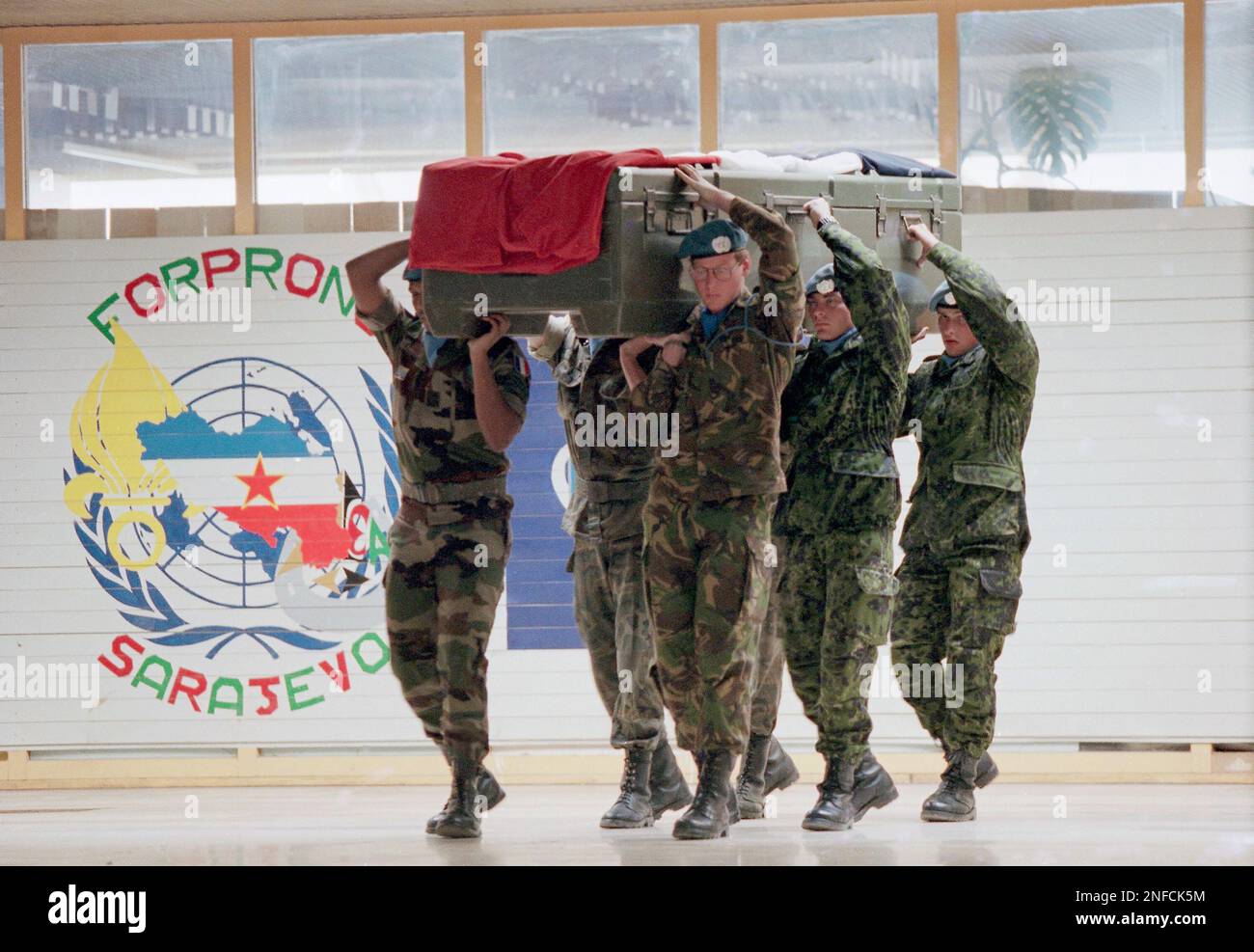 French United Nations peacekeepers carry a casket, Sunday, April 23 ...