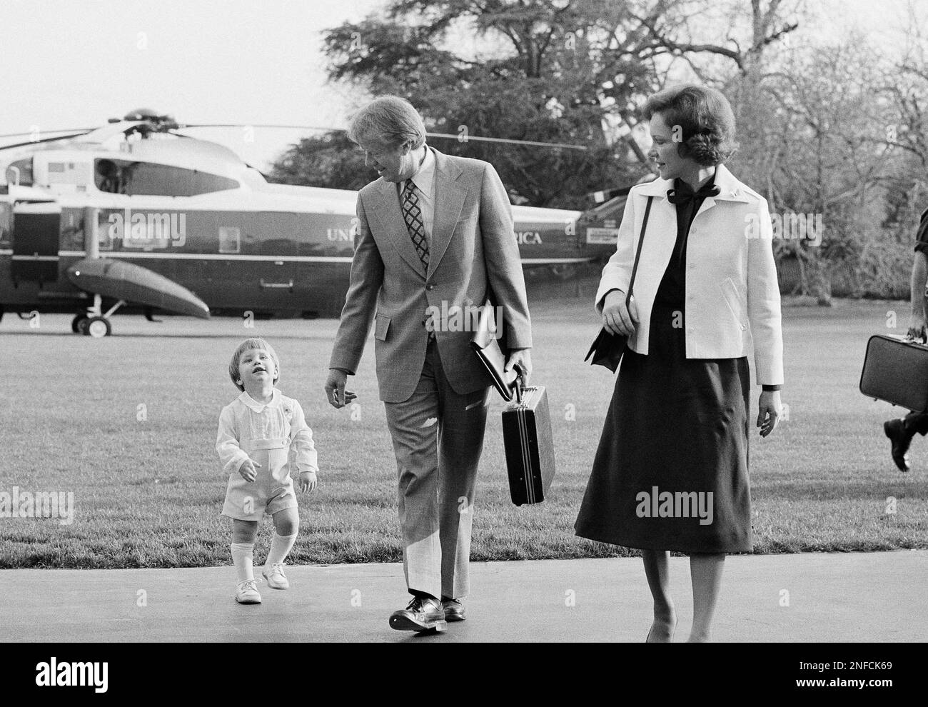 President Jimmy Carter, and grandson Jason, two-years-old, return to ...