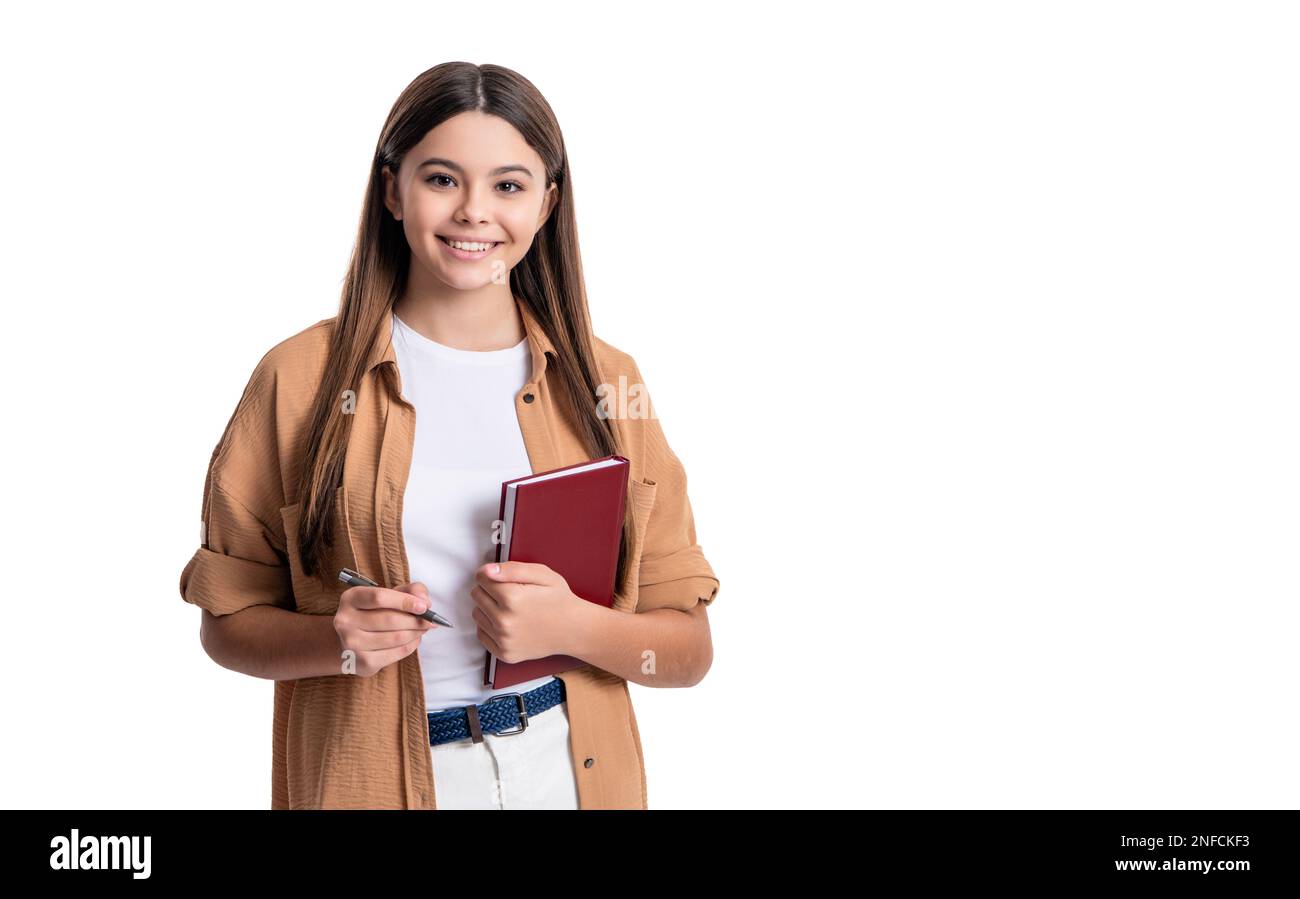 cheerful teen girl holding school diary in studio. teen girl with ...