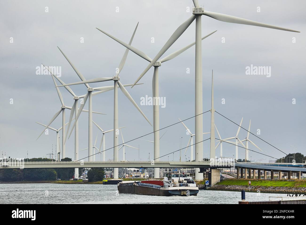 Wind tubines along the waterside Stock Photo - Alamy