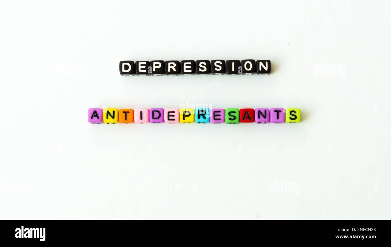 Depression word in black letter beads on white background. Mental ...