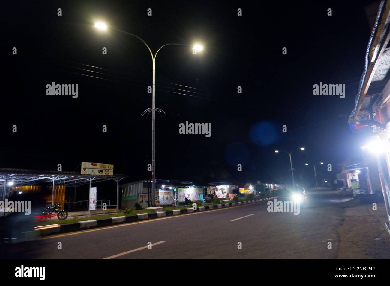Illuminating Street Lights At Night, In The City Of Muntok, Indonesia ...