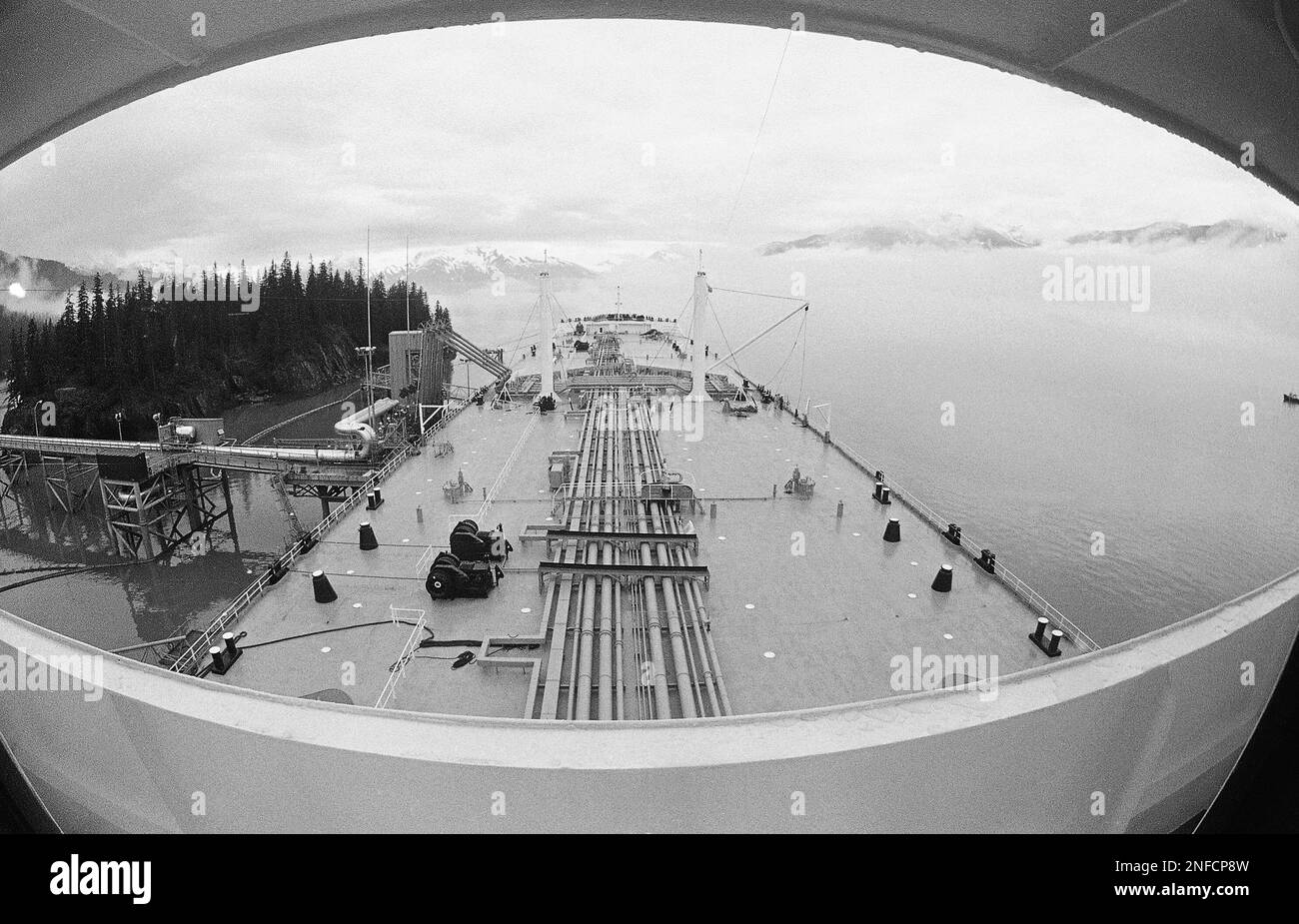 This general view of the tanker ARCO Juneau shows pipes at left that ...