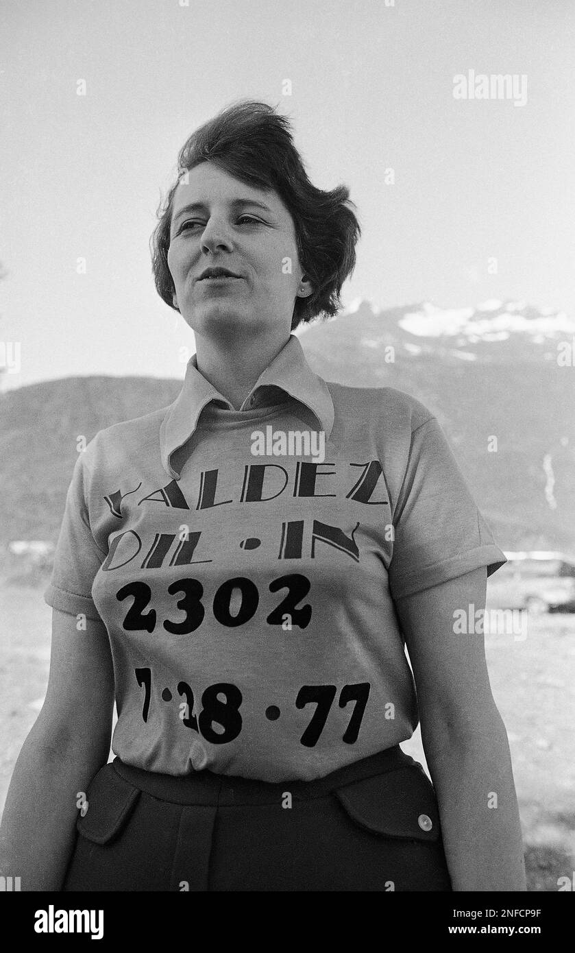 Sue Lang models the T-shirt she designed giving the time, 2302 hours or ...