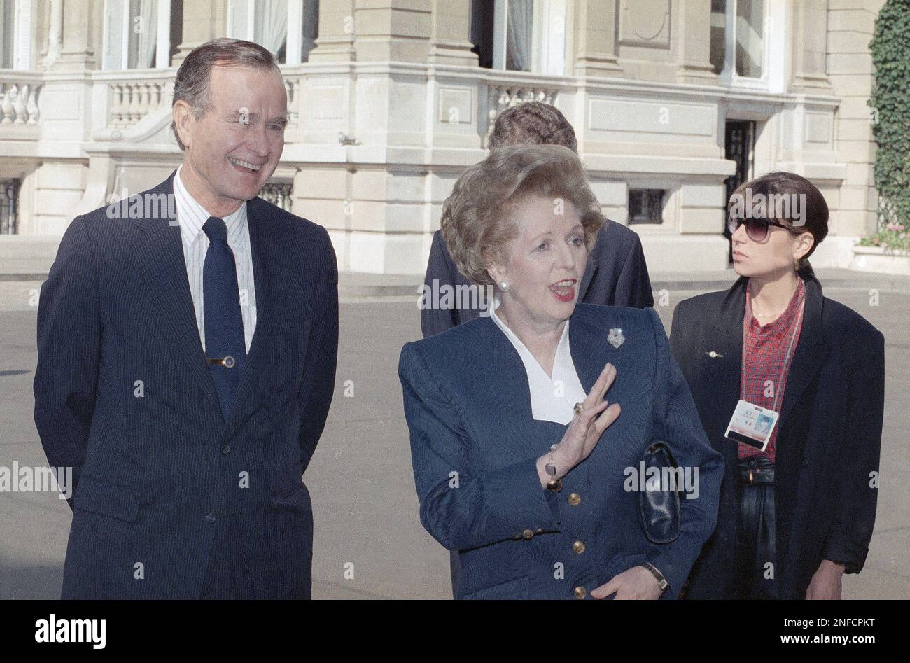 British Prime Minister Margaret Thatcher gestures as she walks from the ...