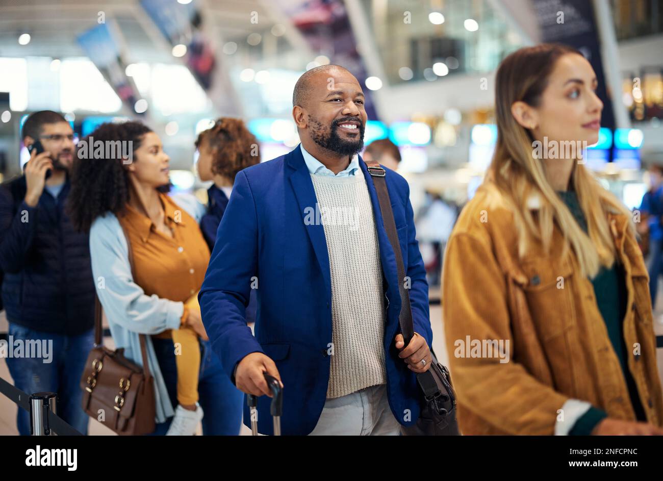 Travel, queue and smile with black man in airport for flight, vacation ...
