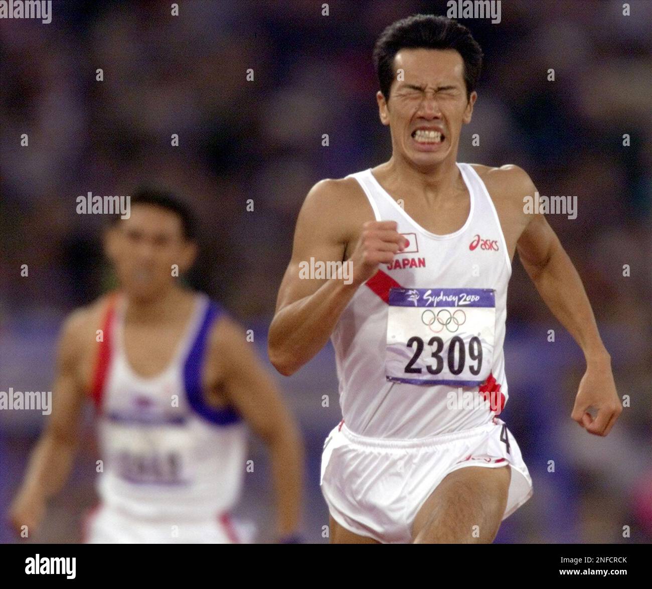 Japan's Hideaki Kawamura competes in the 400-meter hurdles at the ...