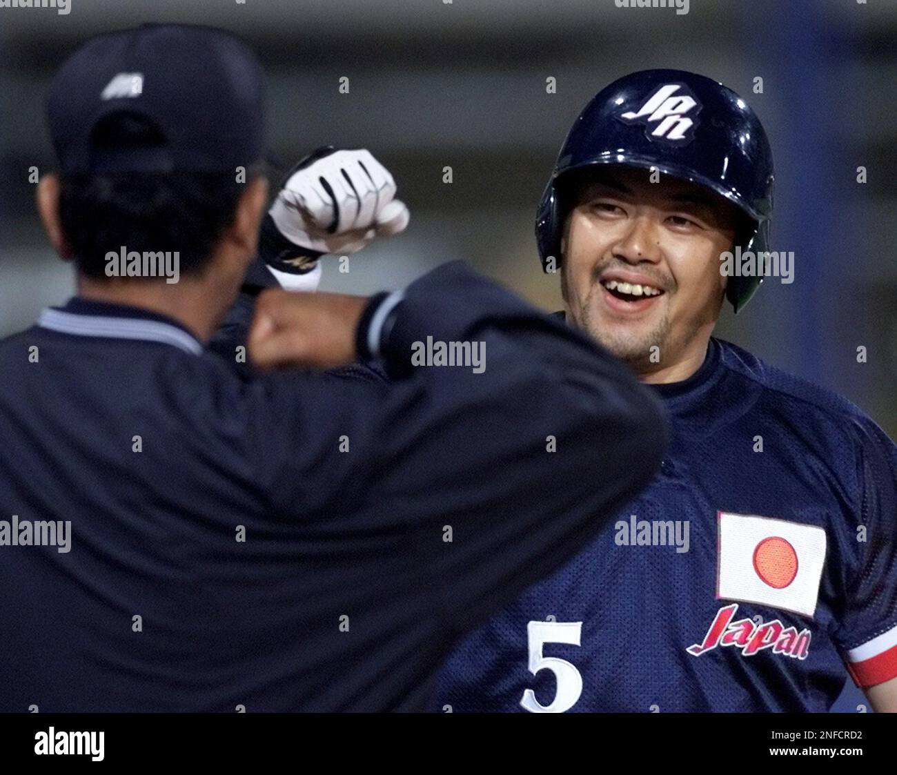 Japan's Norihiro Nakamura (5) celebrates his two-run home run in the ...