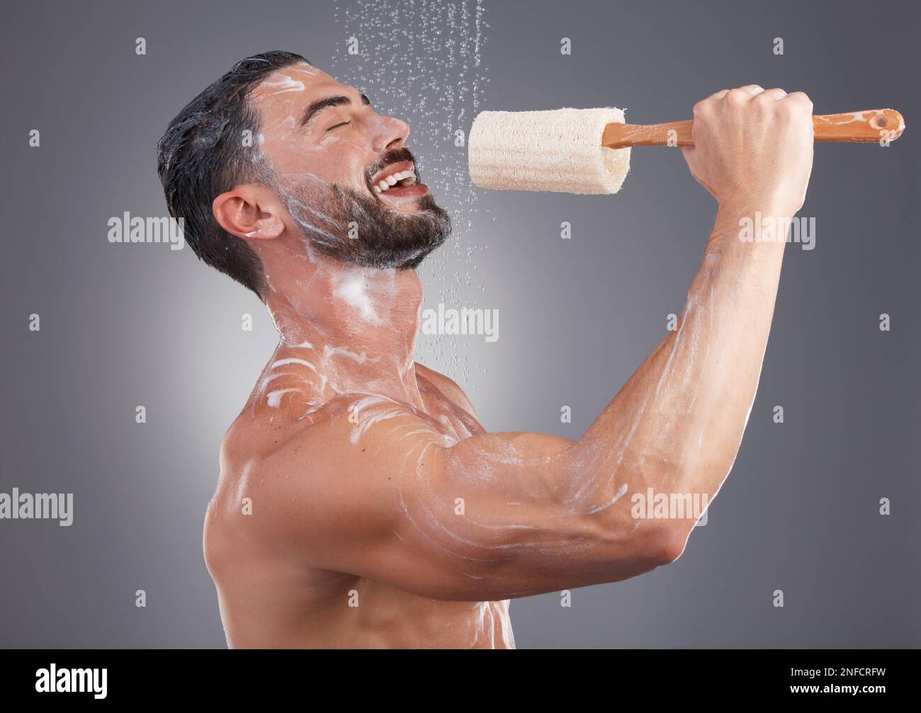 Shower, cleaning and man singing with brush in studio for skincare ...