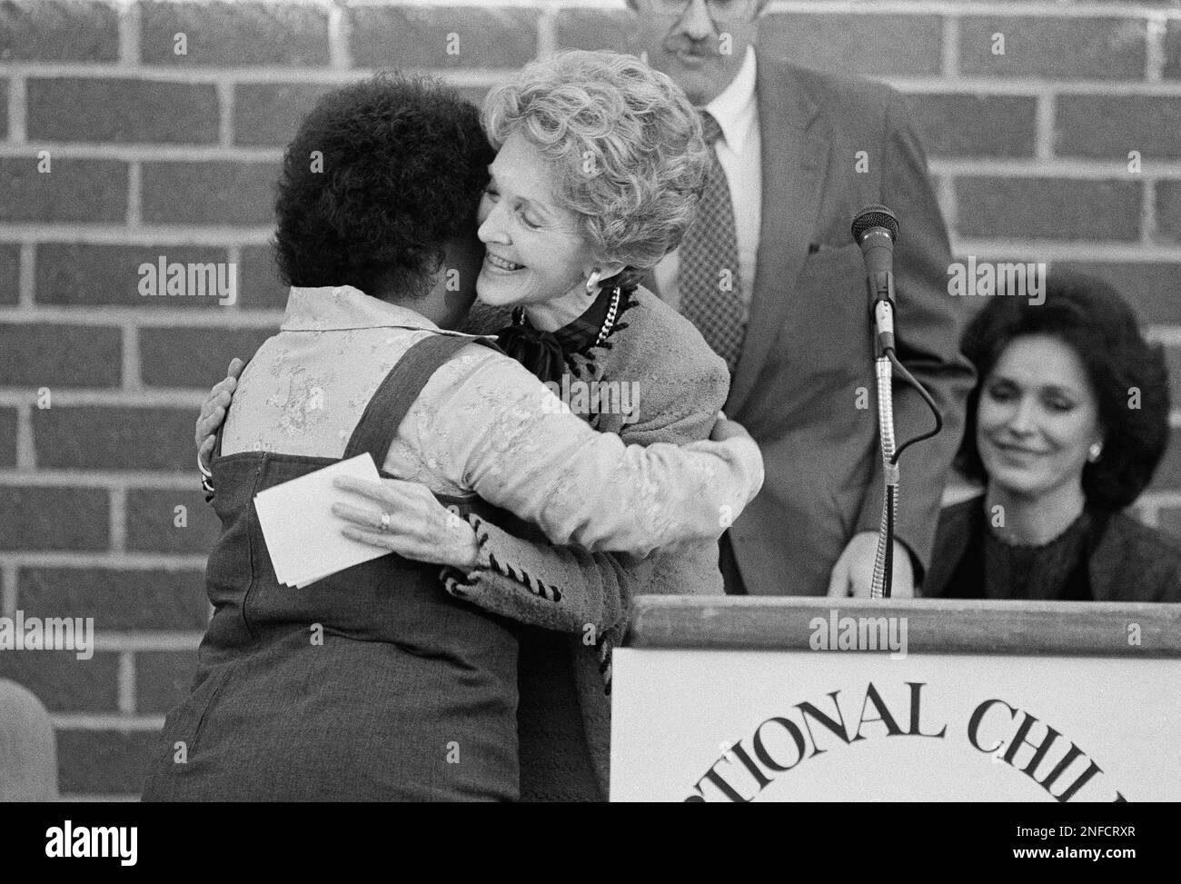 First lady Nancy Reagan gives a hug to J'meme Boyd, a student at the ...