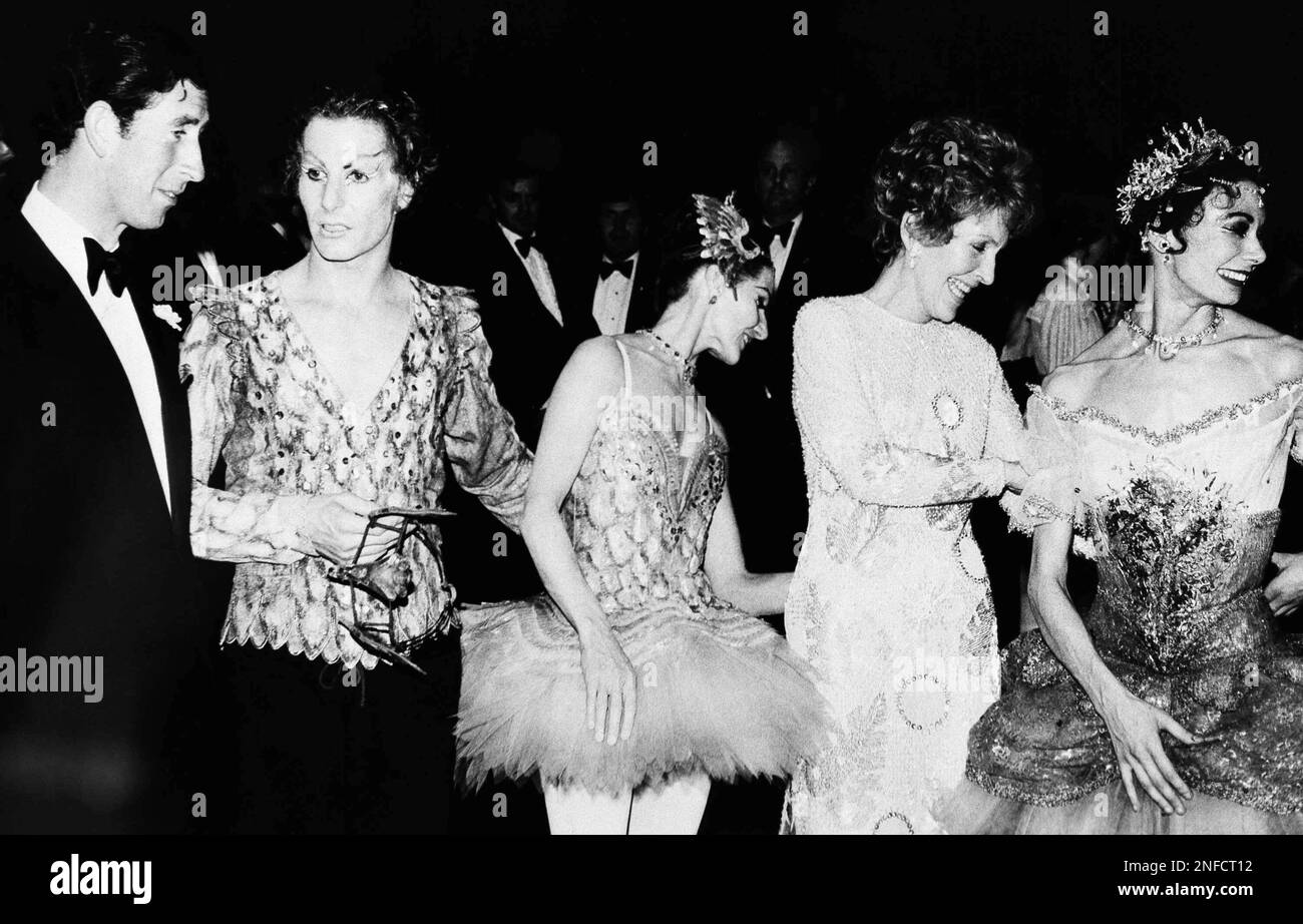 Prince Charles and members of the Royal Ballet watch as Nancy Reagan ...