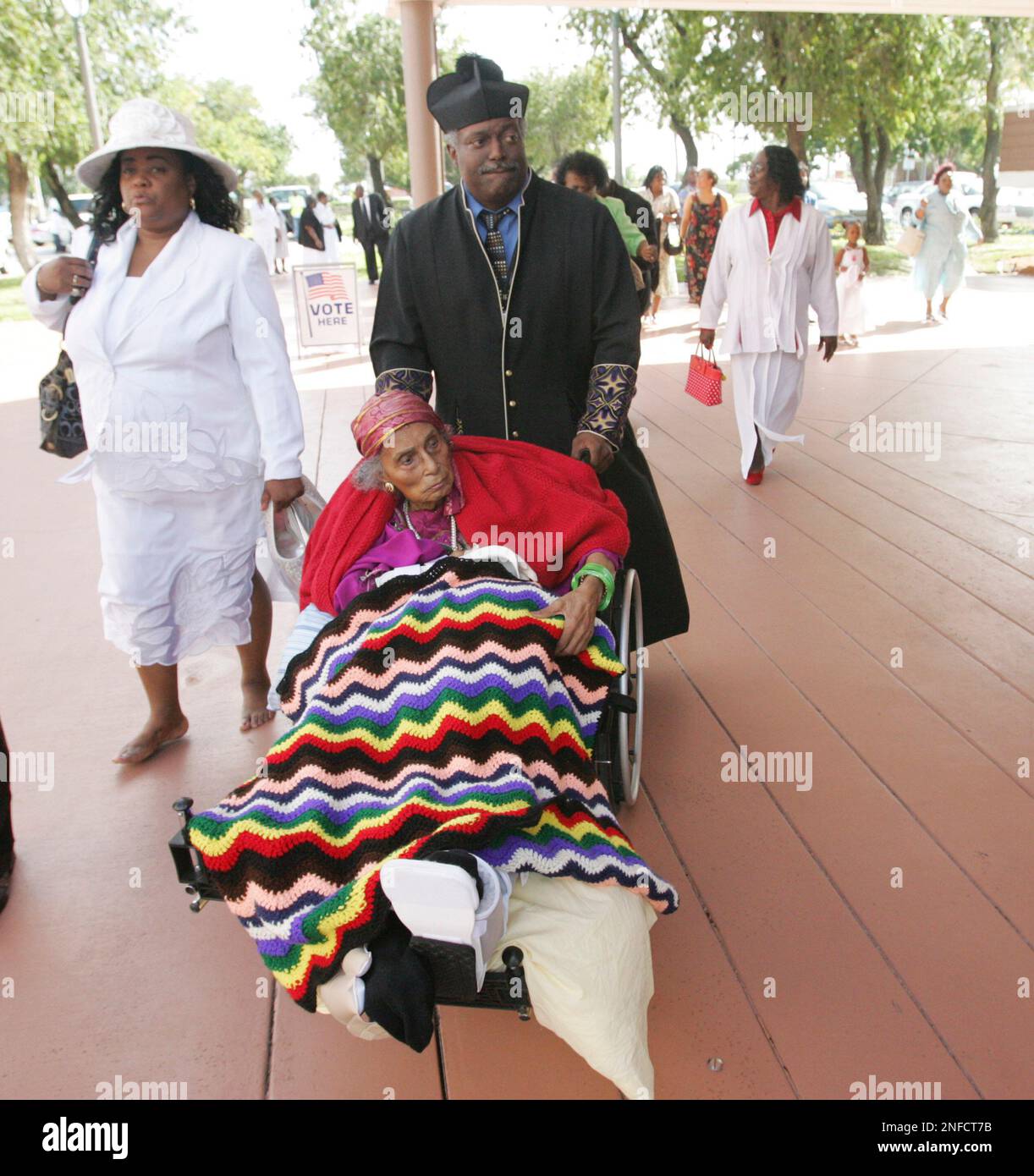 The Mayor Rev. Thomas Masters pushes his 95-year-old mother, Isabell ...