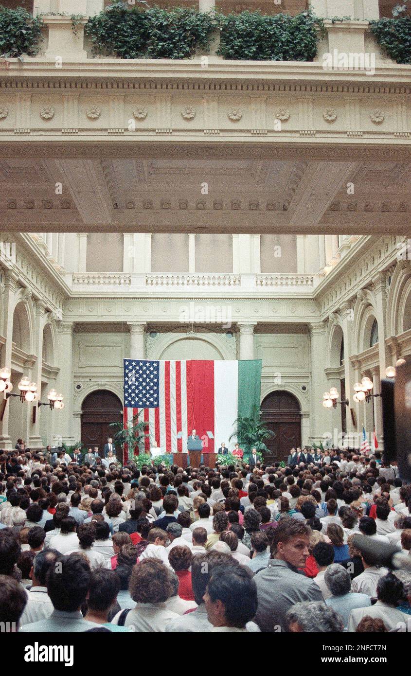 With American and Hungarian flags as backdrops, U.S. President George ...