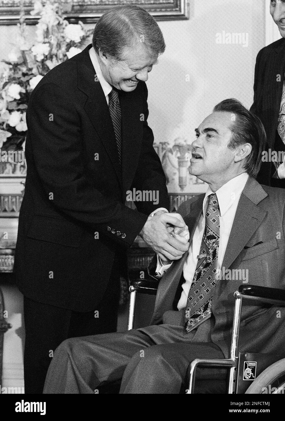 Alabama Gov. George Wallace is greeted by President Jimmy Carter at the ...