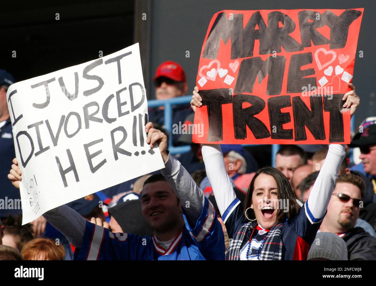 Buffalo Bills fans hold up signs during the game against the New York ...
