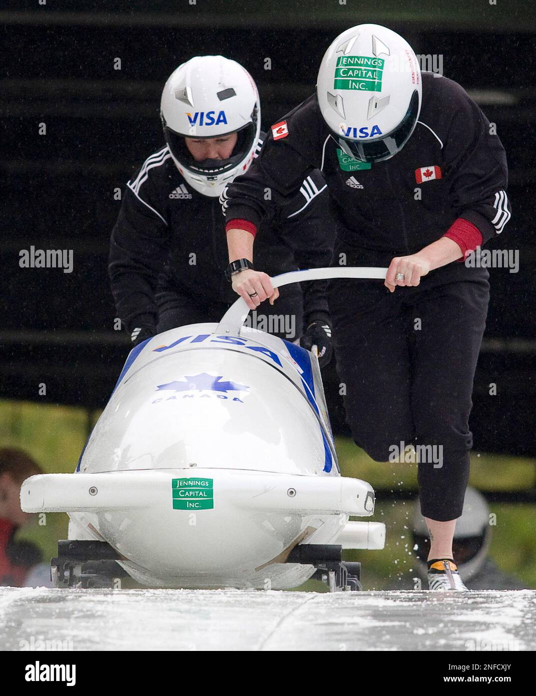 Canada's Helen Upperton and Jenny Ciochetti prepare to race down the ...