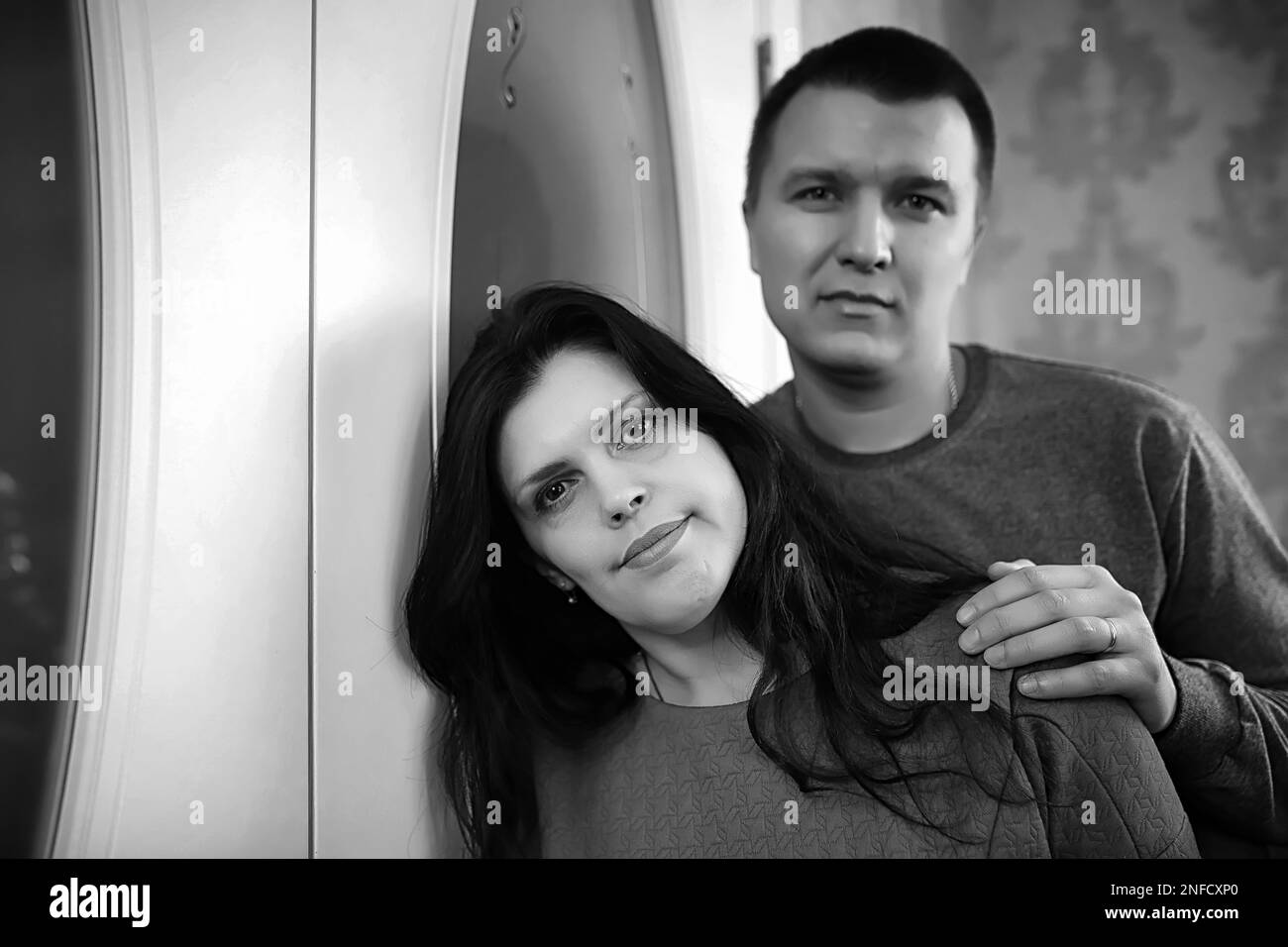 Young white family in a home on weekends relax time Stock Photo - Alamy