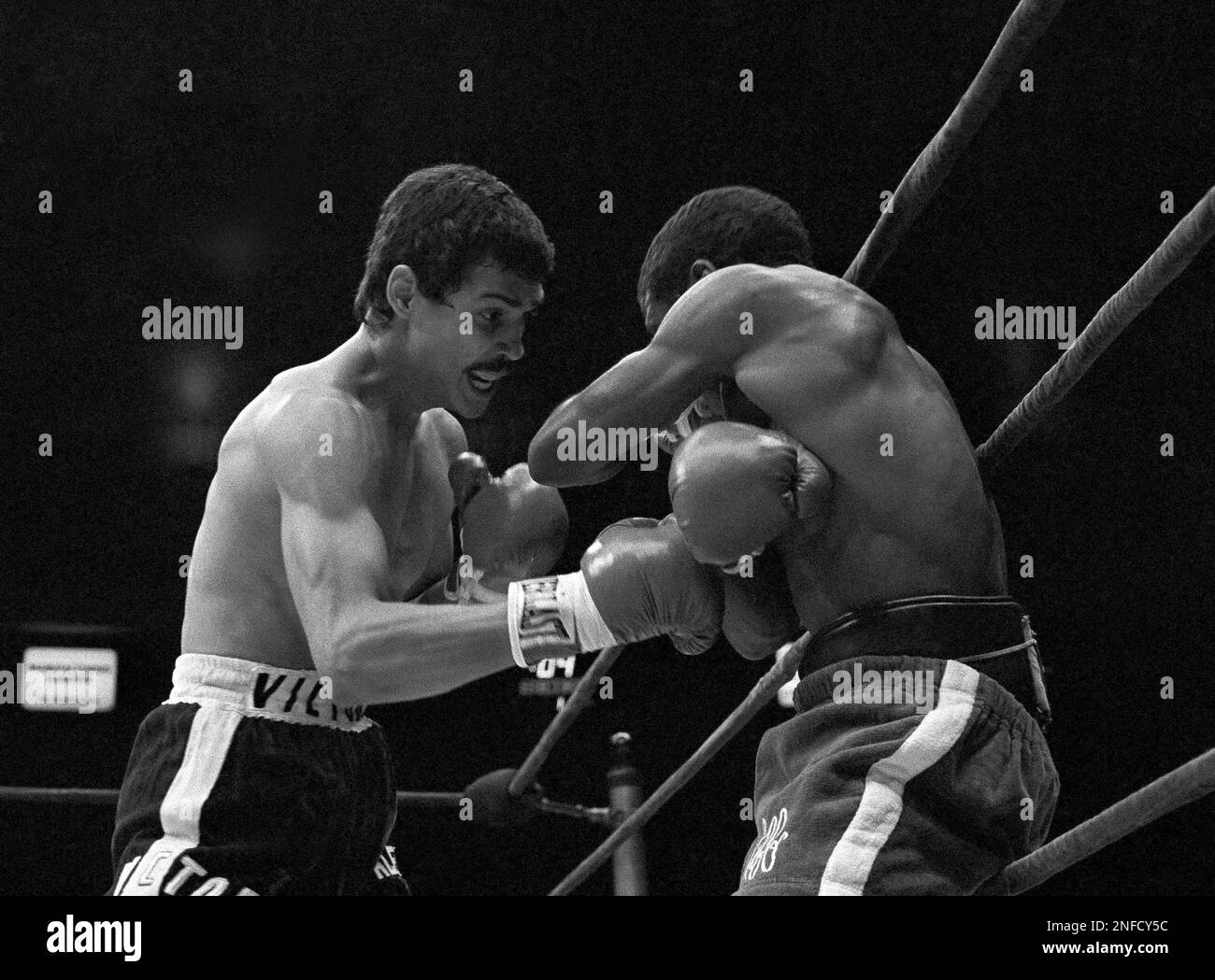 Alexis Arguello, left, of Nicaragua, has a right hand punch blocked by ...
