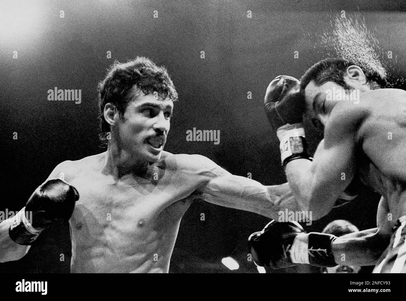 Champion Alexis Arguello of Nicaragua lands a left hook to the head of ...