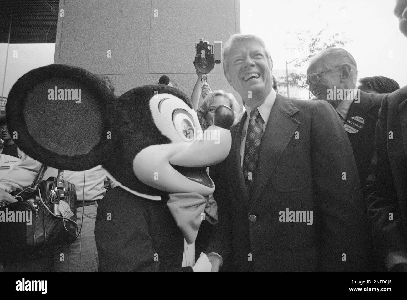 Democratic presidential nominee Jimmy Carter grins as he meets a ...
