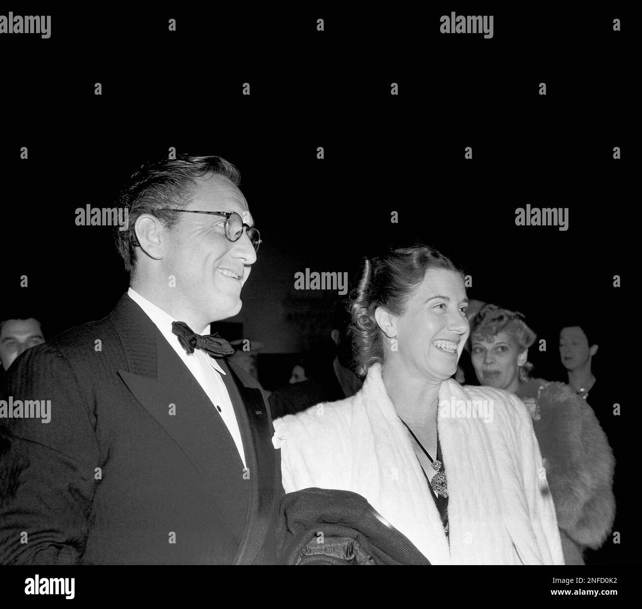 Mr. Spencer Tracy, left, and his wife Mrs. Louise Tracy shown at opera ...