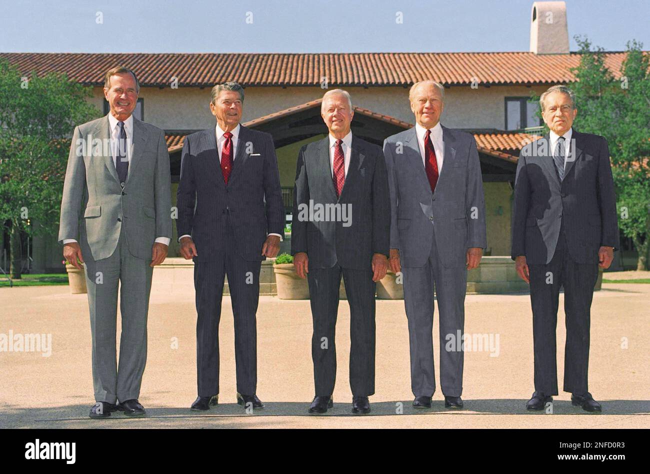 President George Bush, left, poses with former Presidents Ronald Reagan ...