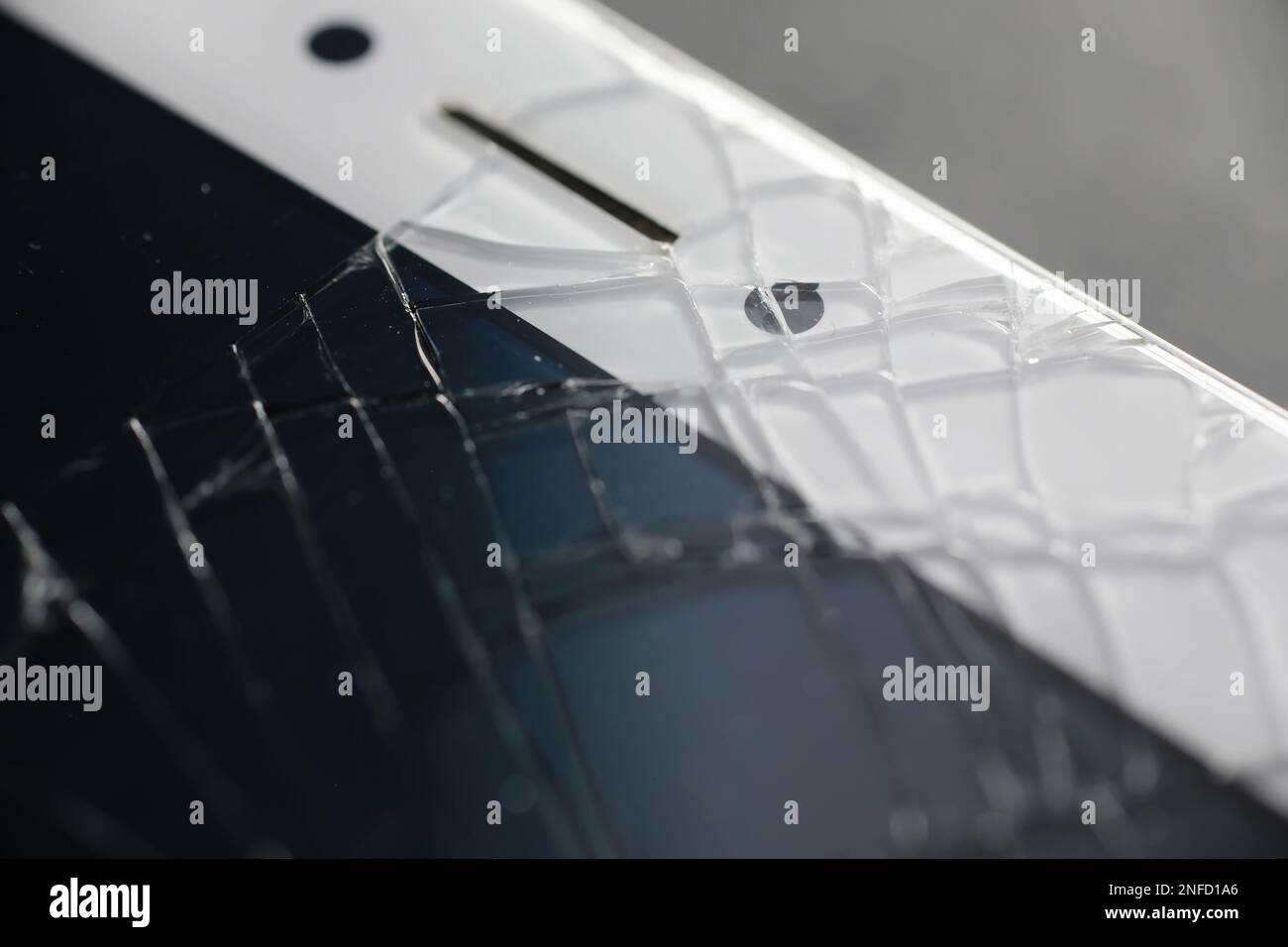 Crack on the glass. Broken screen. Broken phone. Cracked glass ...