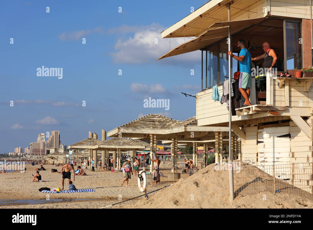 HAIFA, ISRAEL - NOVEMBER 1, 2022: Lifeguards watch over sandy Dado ...