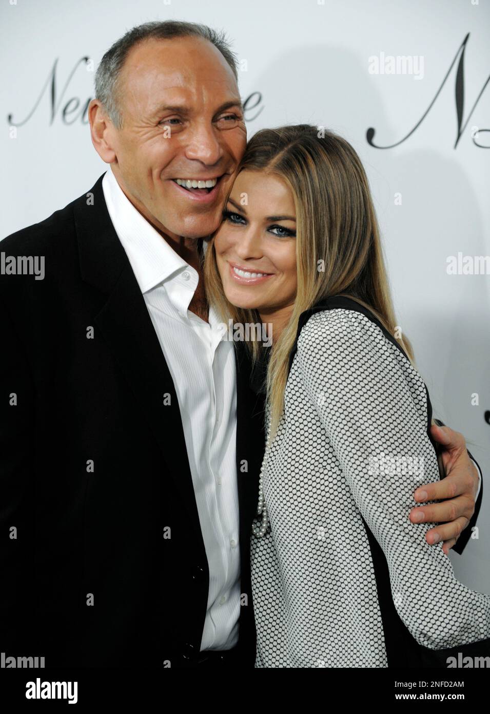Carmen Electra and Neil Lane pose together at the private opening of ...