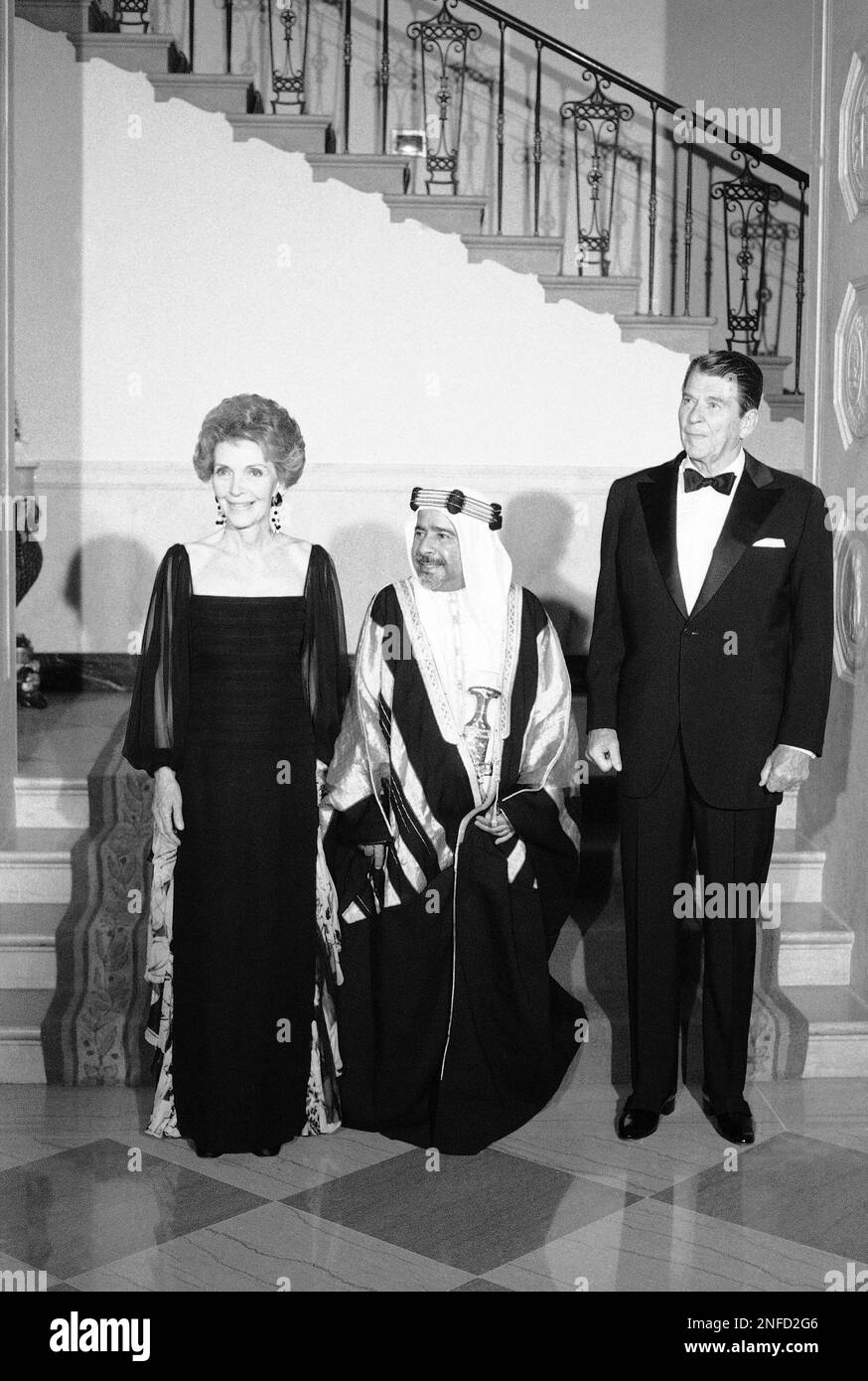 U.S. President Ronald Reagan and first lady Nancy Reagan shown with Ian ...