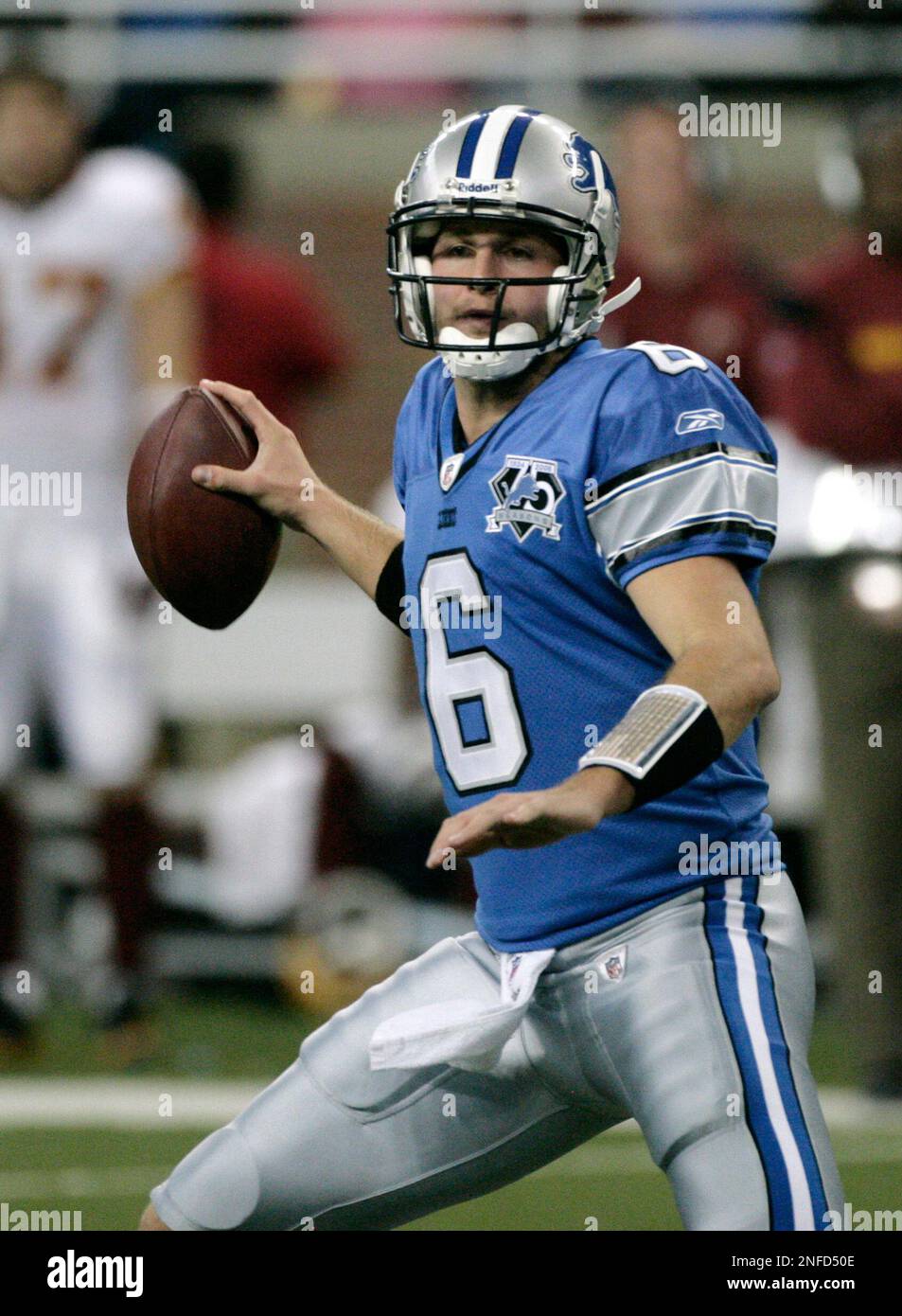 Detroit Lions quarterback Dan Orlovsky looks to pass against the ...