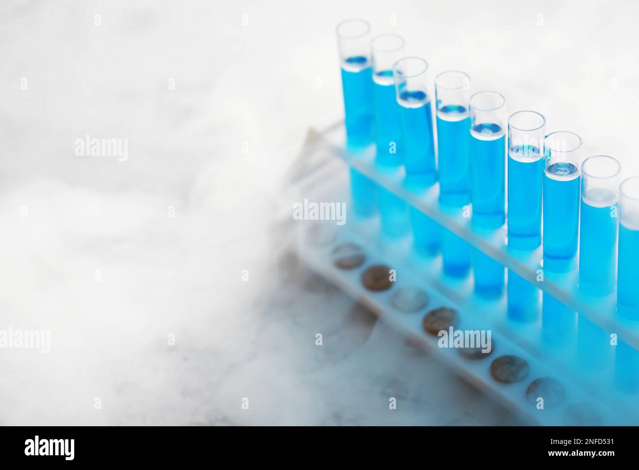 Test tube of glass overflows new liquid solution potassium blue ...